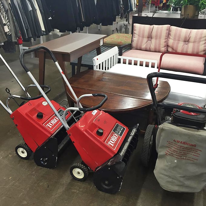Snow blowers and furniture create an oddly perfect Michigan vignette. Winter preparedness meets home comfort in this corner of practical possibilities.