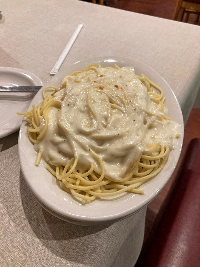 Alfredo sauce so rich and creamy it should come with its own inheritance tax. Coating each strand of pasta in a blanket of pure indulgence.