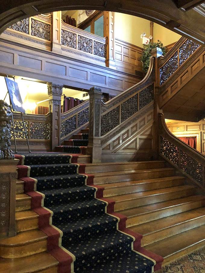 A grand staircase that whispers tales of elegance while promising culinary adventures await on every floor.