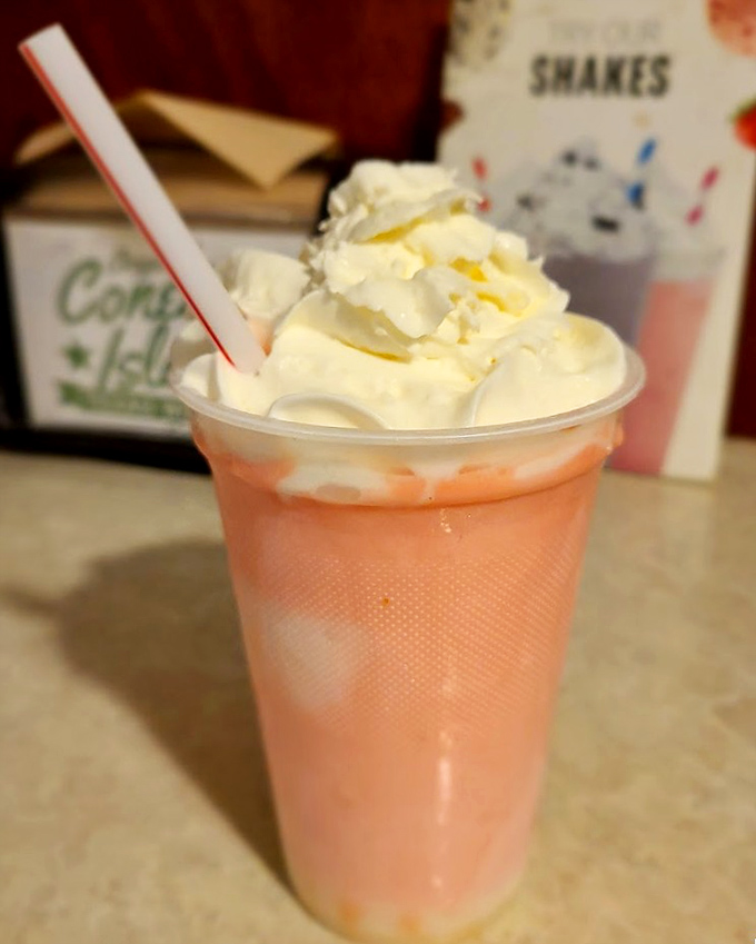 A strawberry shake topped with whipped cream that's not just a drink but a dessert worthy of its own Instagram account &ndash; if Instagram existed when this place opened.