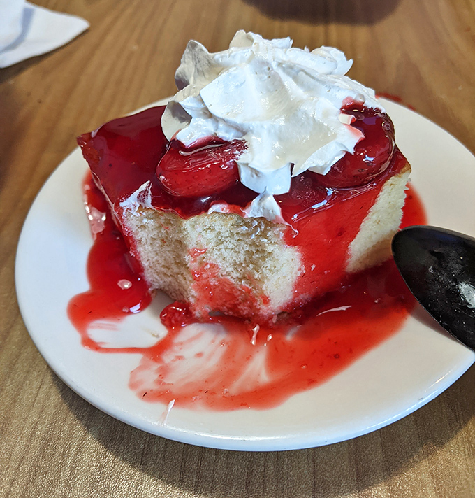 This strawberry shortcake isn't just dessert&mdash;it's edible artwork. The whipped cream crown melts into sweet berry sauce like a delicious chemistry experiment.