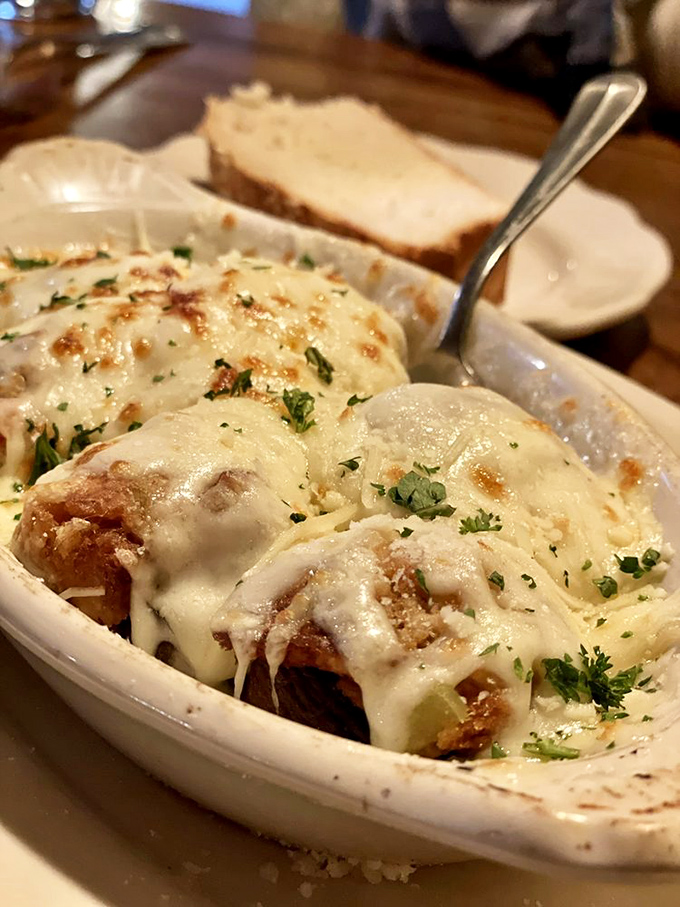 These cheese-blanketed stuffed delights aren't just mushrooms&mdash;they're little umami bombs that could convert even the most dedicated fungus skeptics.