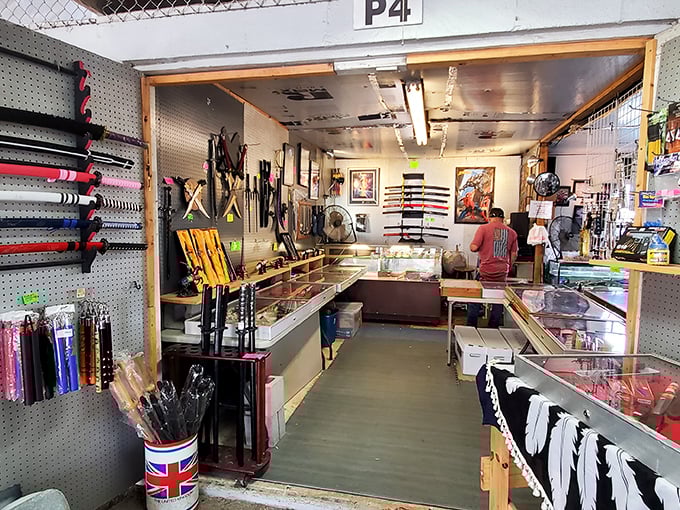Not your average retail experience! This specialized vendor space showcases everything from collectible knives to sporting goods with museum-like precision.