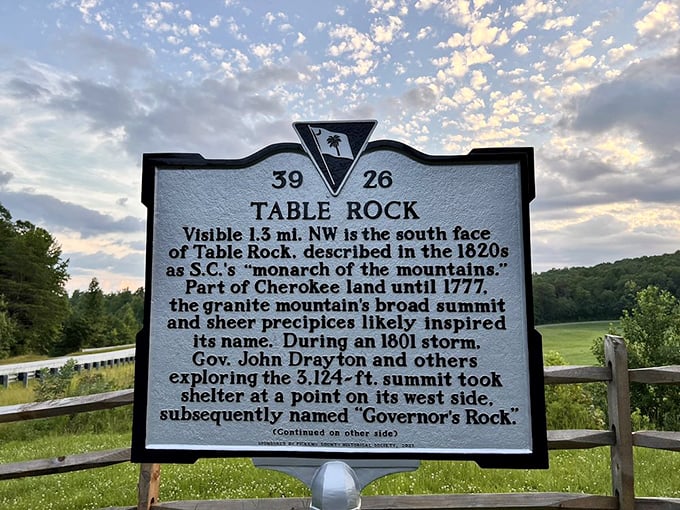 History carved in granite and commemorated in metal. This marker tells the story of a mountain that's been impressing visitors since long before Instagram.