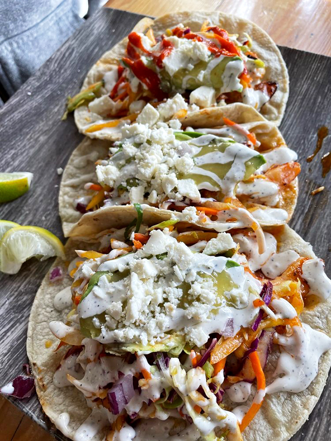 Fish tacos that capture San Diego in every bite. The white sauce drizzle and fresh toppings create that perfect balance between indulgence and refreshment.