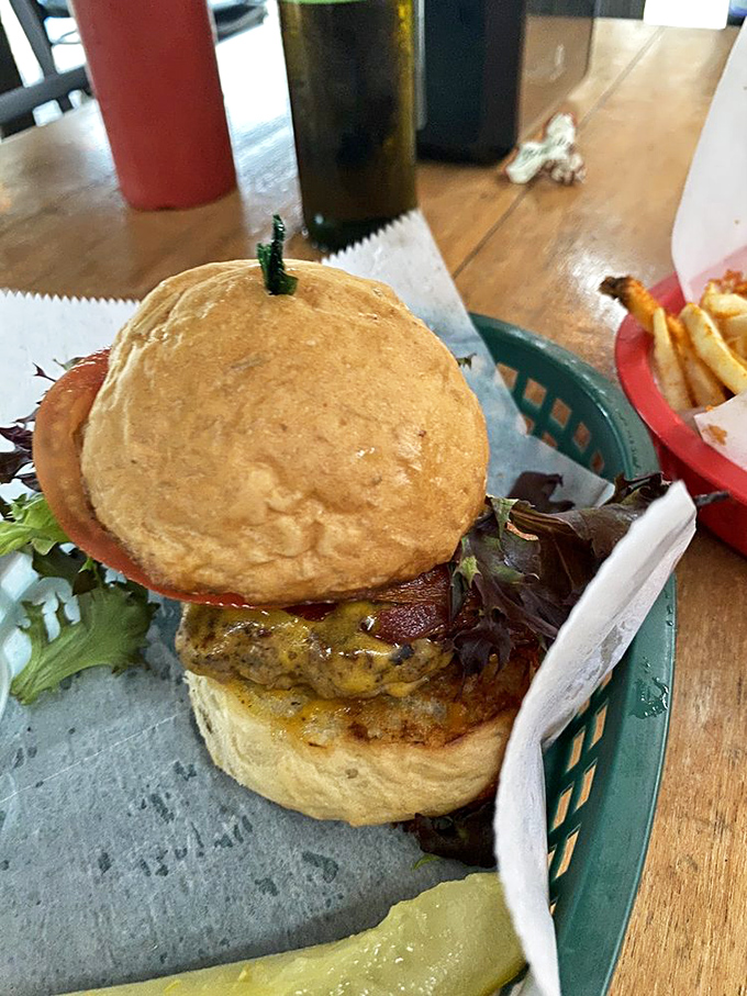 This isn't just a burger &ndash; it's a towering achievement of beef, bun, and toppings that requires jaw gymnastics and absolute focus.