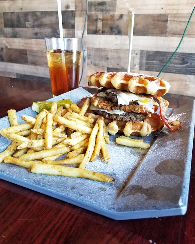 Breakfast and lunch had a beautiful baby. Waffles as burger buns? This is the kind of innovation America was built on.