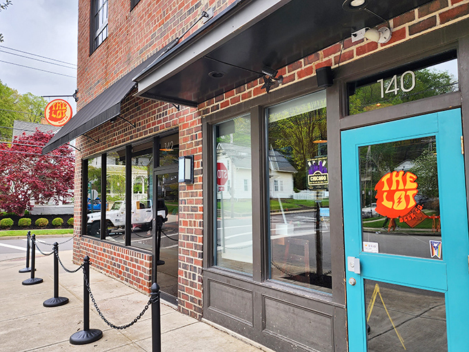 The Lot Beer Co.'s turquoise door stands out like a cheerful beacon for craft beer enthusiasts everywhere.