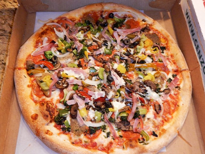 "The Works" pizza&mdash;where every topping finds its place without overwhelming the palate. A delicious democracy where each ingredient votes.