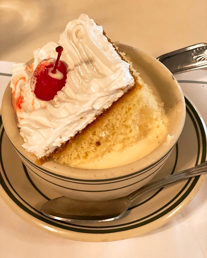 Three milk cake that floats like a cloud in a sweet pool of heaven &ndash; topped with a cherry that's purely ceremonial at this point.