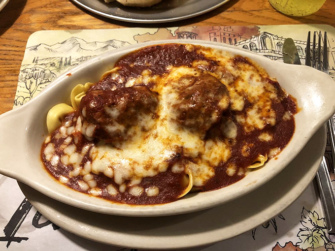 Tortellini swimming in red sauce with meatballs standing guard. This dish doesn't just satisfy hunger&mdash;it creates memories that linger long after the plate is clean.