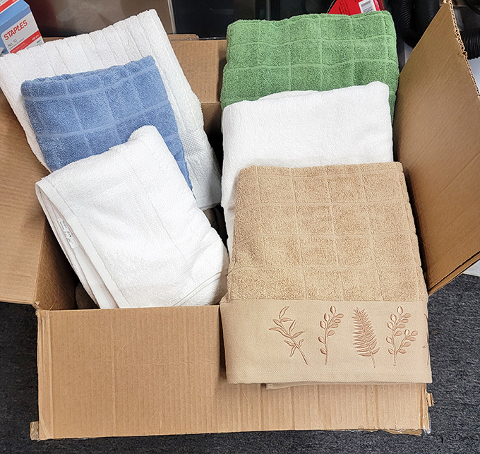Towels stacked like fluffy clouds remind us that even the most mundane household items deserve second chances.