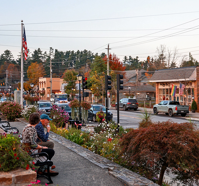 The best conversations happen on these benches. Locals and visitors alike pause to appreciate downtown's flower displays and unhurried pace.