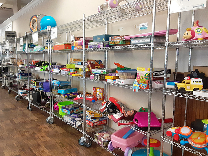 Childhood memories priced to move - plastic treasures and board games awaiting their second act in a new family's story.