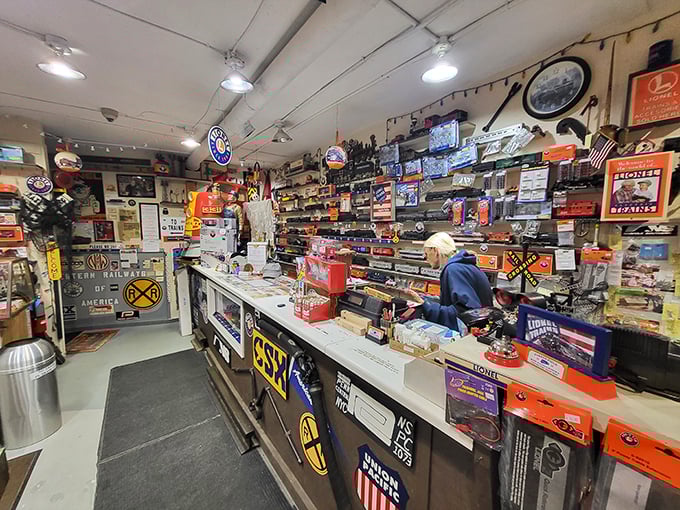 The trading post portion of Corner Field is where dreams and credit cards meet. Railroad memorabilia covers every surface like wallpaper made of nostalgia.