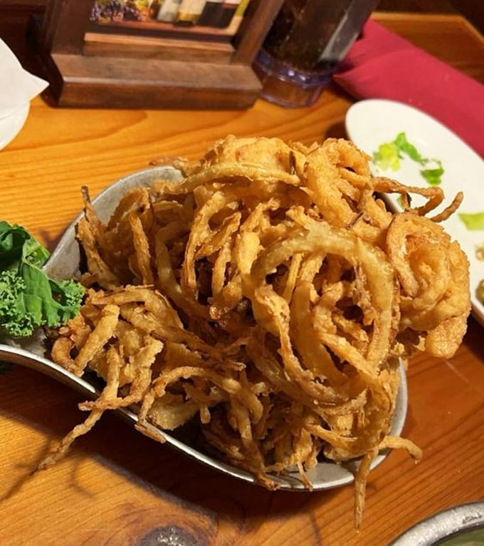 Onion rings that defy gravity&mdash;a golden, crispy tower that makes French fries look like they're not even trying.