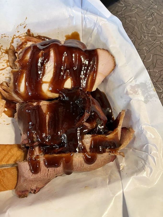 Turkey and brisket sharing a plate like old friends. The sauce cascades down with such purpose you can almost hear it saying "you're welcome."