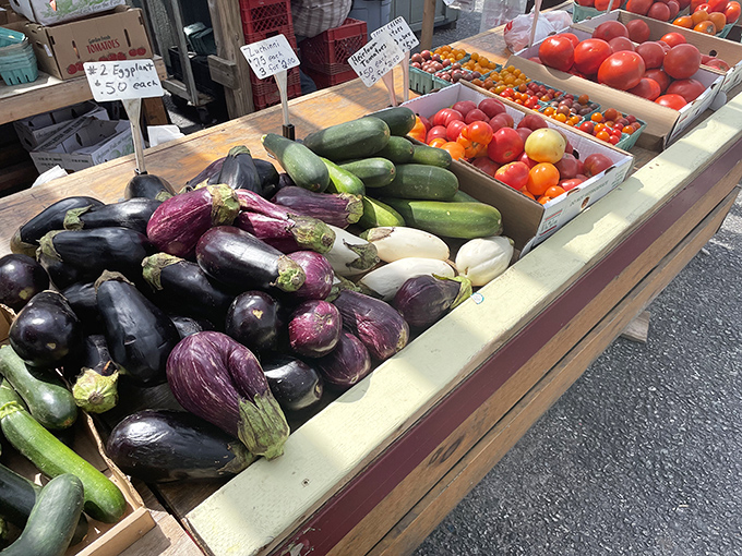 Garden-fresh vegetables arranged with farmer's pride &ndash; proof that the best food styling happens naturally at market stands.