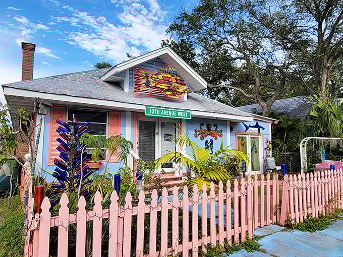 The Village of the Arts' colorful cottages prove that HOA color restrictions aren't universal. This pink fence would cause a revolt in most neighborhoods.