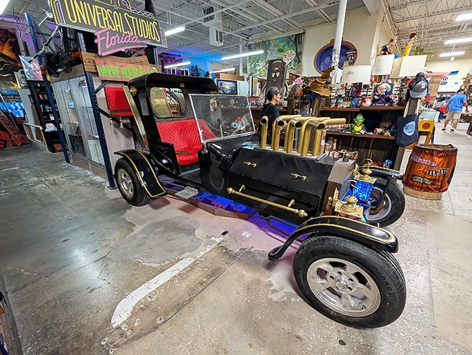 This vintage vehicle isn't just transportation&mdash;it's automotive theater. Universal Studios memorabilia in the background hints at its showbiz connections.