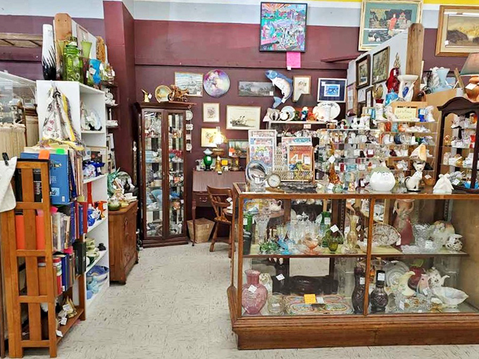 A collector's paradise where porcelain figurines share space with framed artwork in a delightful jumble of decades past.