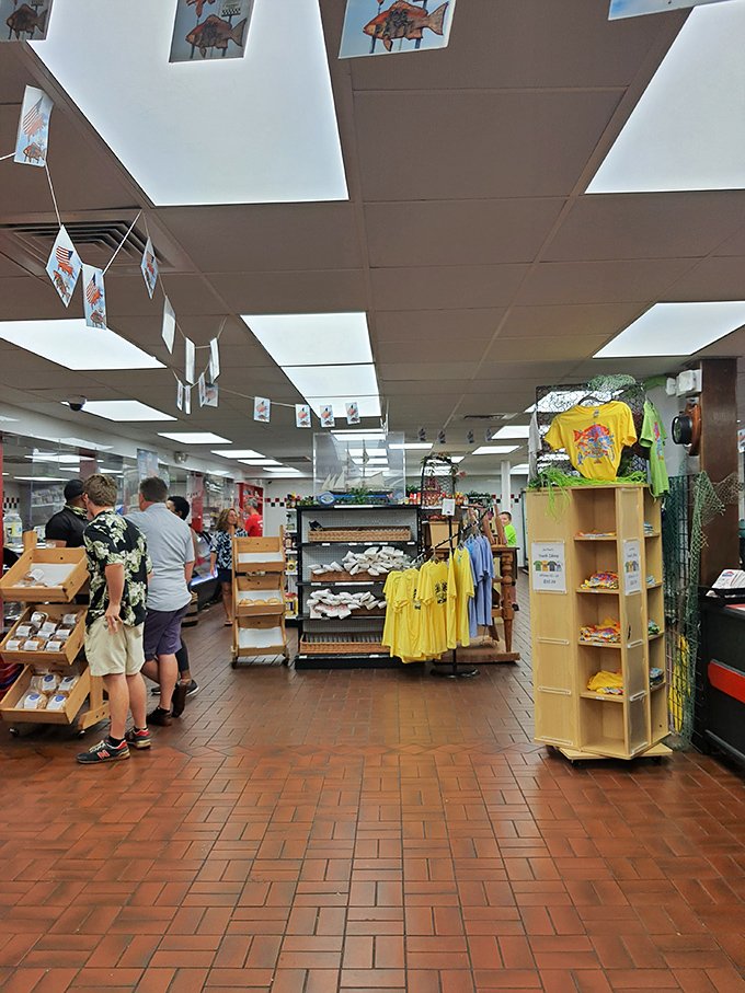 The market's interior has the cheerful bustle of a culinary treasure hunt, complete with hanging fish decorations guiding your journey.
