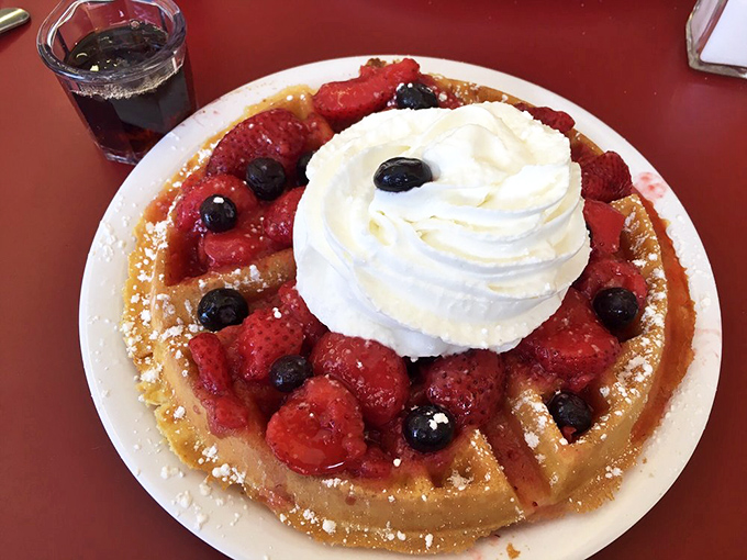 Berry-topped waffle perfection that makes you wonder why anyone bothers with avocado toast and green smoothies.