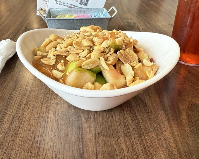A fresh take on fruit salad &ndash; crisp apples and crunchy peanuts create a symphony of textures that somehow feels both indulgent and virtuous.