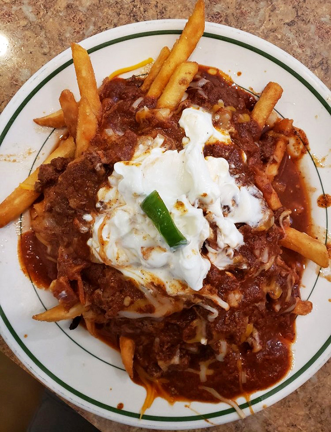 This isn't your ordinary poutine&mdash;it's a Wisconsin interpretation that would make even Canadians do a double-take. French fries swimming in chili and topped with sour cream? Yes, please!