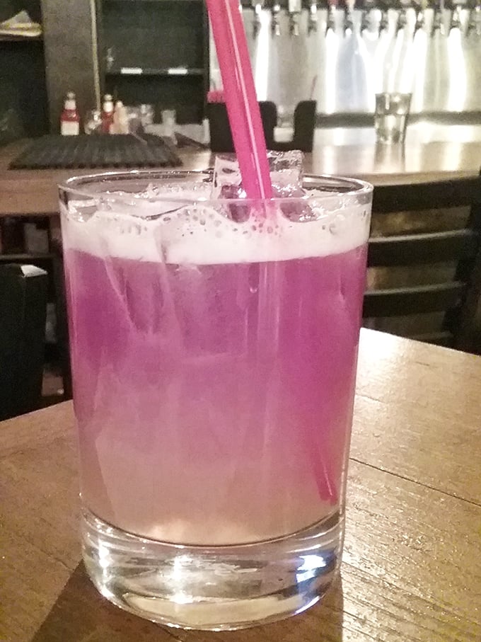 This vibrant purple cocktail isn't just a drink &ndash; it's a conversation starter. Like a sunset in a glass, it promises refreshment with a side of intrigue.