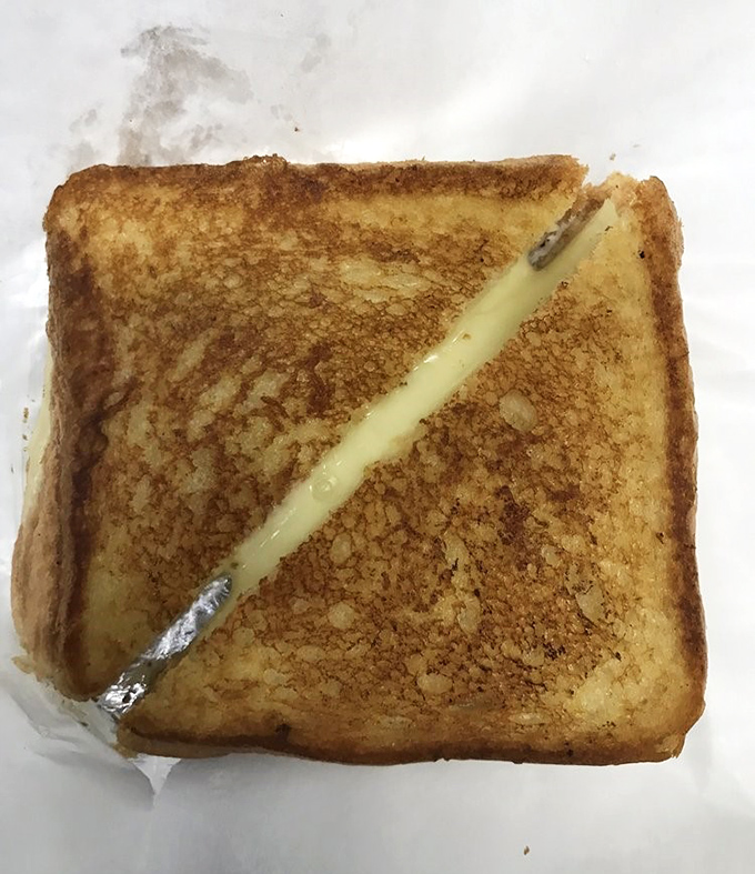 The humble grilled cheese, elevated to art form. Between those perfectly golden slices lies the melty treasure we all deserve.