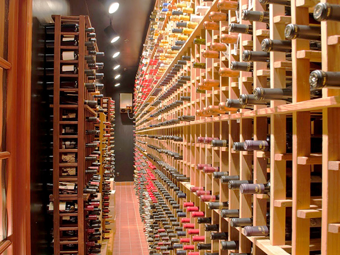 Not just a wine cellar&mdash;a cathedral of cabernet where bottles wait patiently for their moment to shine alongside a perfect cut.