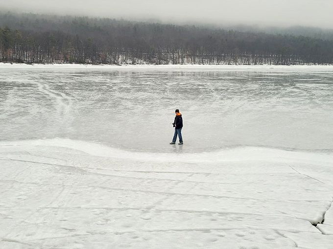 Winter transforms the reservoir into a vast frozen playground where brave souls venture onto nature's temporary floor &ndash; no waxing required.