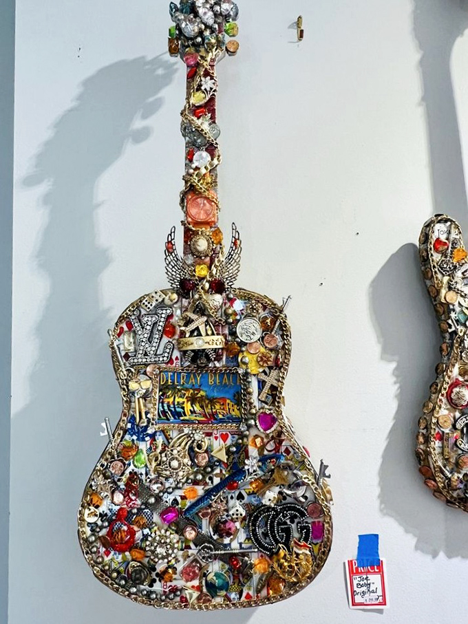 Not just a guitar&mdash;a wearable autobiography. Someone transformed this instrument into a bedazzled masterpiece celebrating Delray Beach in rhinestone glory.