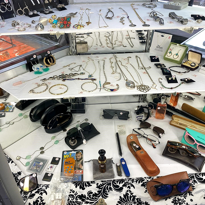 Jewelry displays that would make a magpie swoon. Someone's once-treasured accessories waiting for their second act in the spotlight.