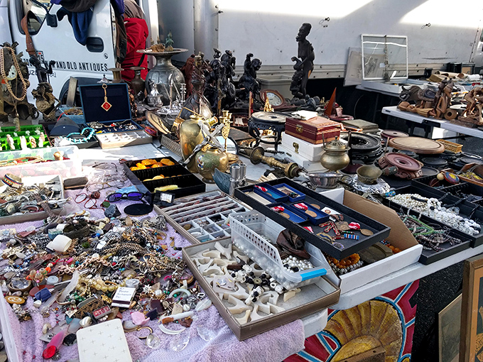 Antique alchemy at work&mdash;brass figurines, vintage jewelry boxes, and curios that transform ordinary shelves into museums of personal history.