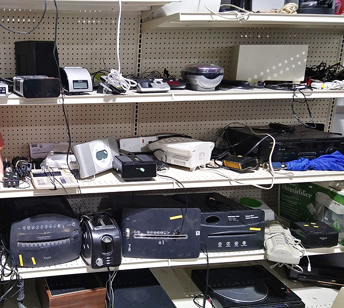 Shelves of electronic gadgets that once cost hundreds now wait patiently for their second act. Marie Kondo's loss is your gain.