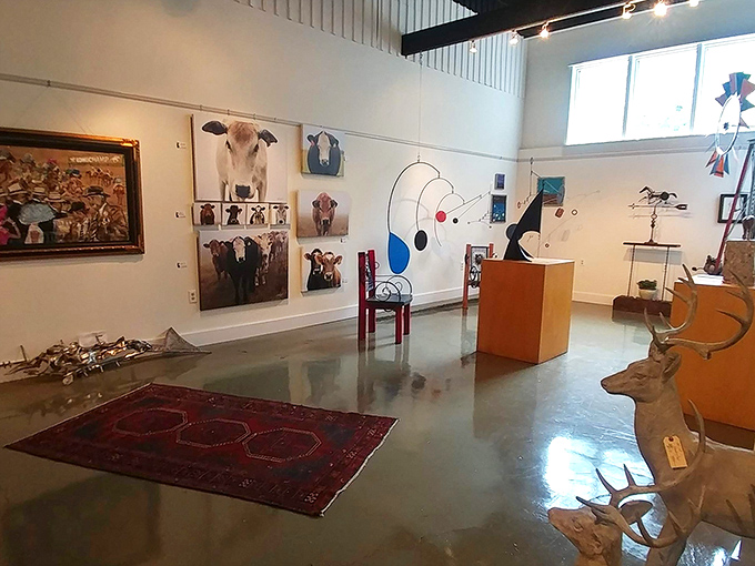 Art that challenges and delights shares space with sculptural elements in this gallery section where contemporary meets classic.