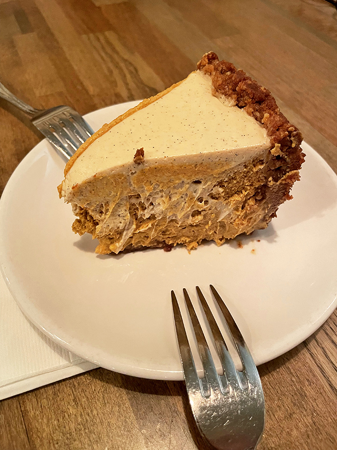 A slice of Bailey's cheesecake that makes you question why you ever considered saving room for dessert optional.