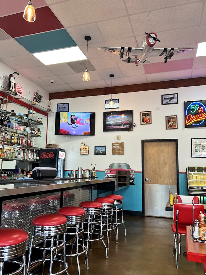 The counter seating offers front-row tickets to the culinary show. Red stools that have supported generations of happy diners and their temporarily expanded waistlines.