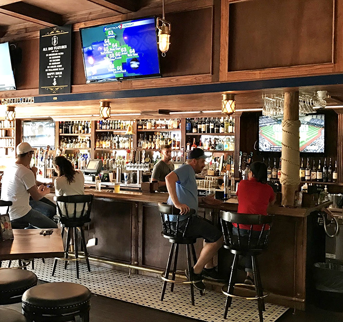 Behind this bar, mixologists craft drinks with the same care and precision that goes into the kitchen's legendary seafood offerings.