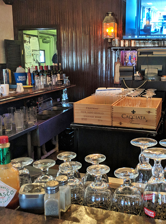Behind every great tavern is a great bar&mdash;this one's stocked with everything needed to wash down that burger, including wine boxes repurposed as clever storage.