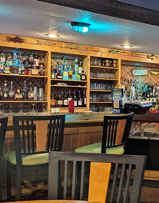 The bar area beckons with promises of cold drinks and warm conversations under nautical charm.