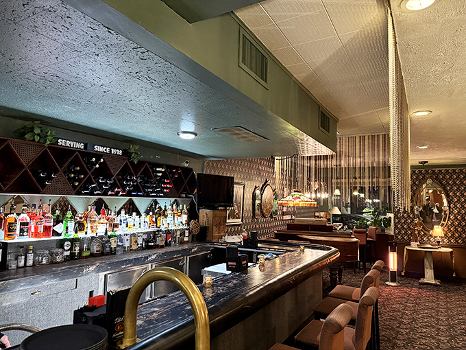 Even the bar setup whispers "authentic Italian experience" louder than most restaurants can shout it.