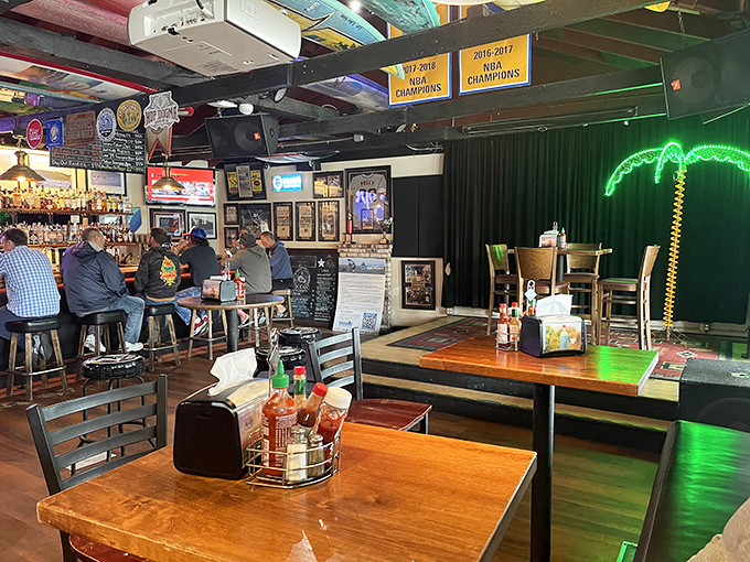 The bar side dining area—where strangers become friends and friends become family over pints and plates of seafood excellence.
