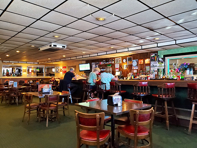 The bar area&mdash;where strangers become friends and regulars are treated like royalty, all under the glow of whatever game is playing.