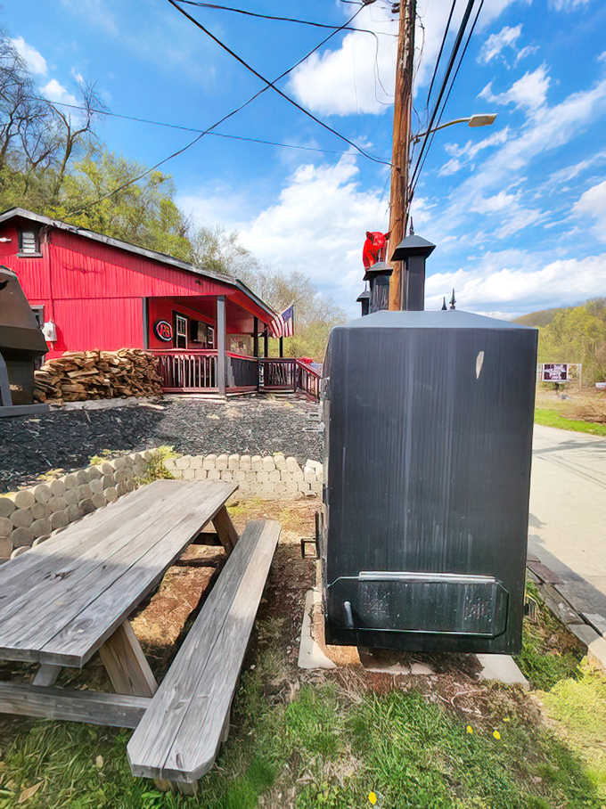 That outdoor smoker and wood pile mean business &ndash; this is where the magic happens, one log at a time.