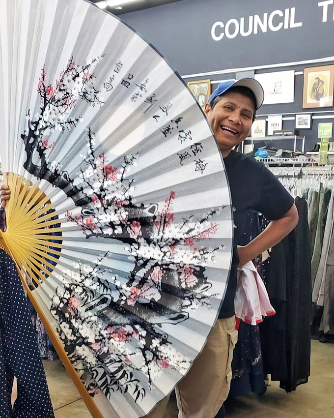This decorative fan isn't just beautiful&mdash;it's large enough to cool you down when you realize you just found designer jeans for under $10.