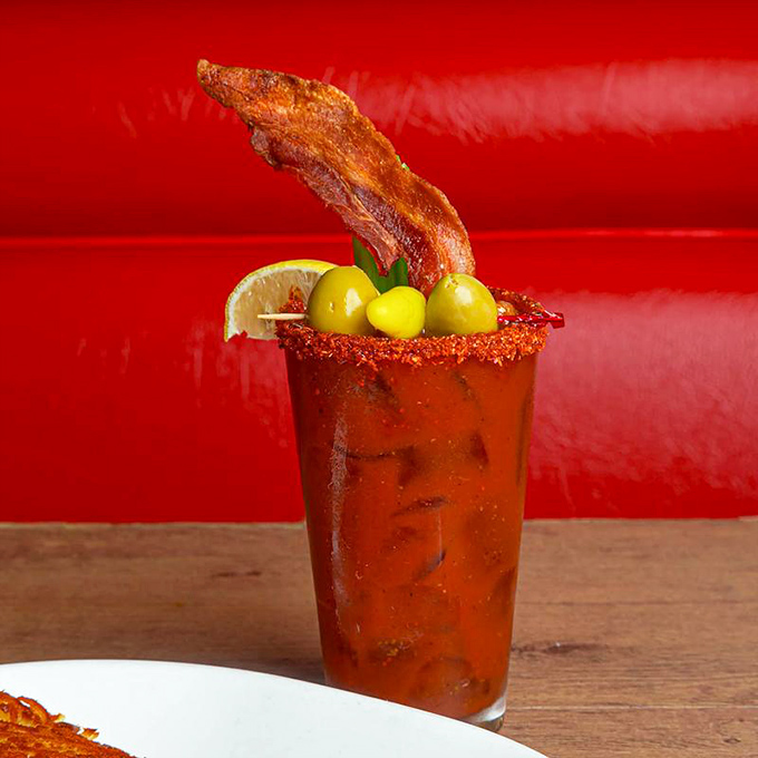 A Bloody Mary that doubles as brunch &ndash; garnished with bacon that stands at attention and olives that add a salty high-five.