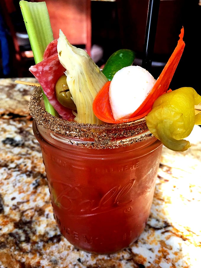 Bloody Mary garnished to perfection - brunch goals achieved in one magnificent glass creation.